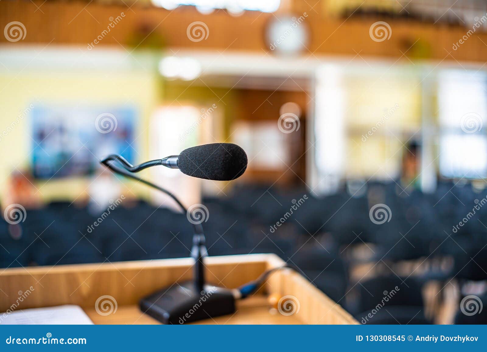 Black Microphone in an Empty Conference Hall, Empty Chair, Ready for ...