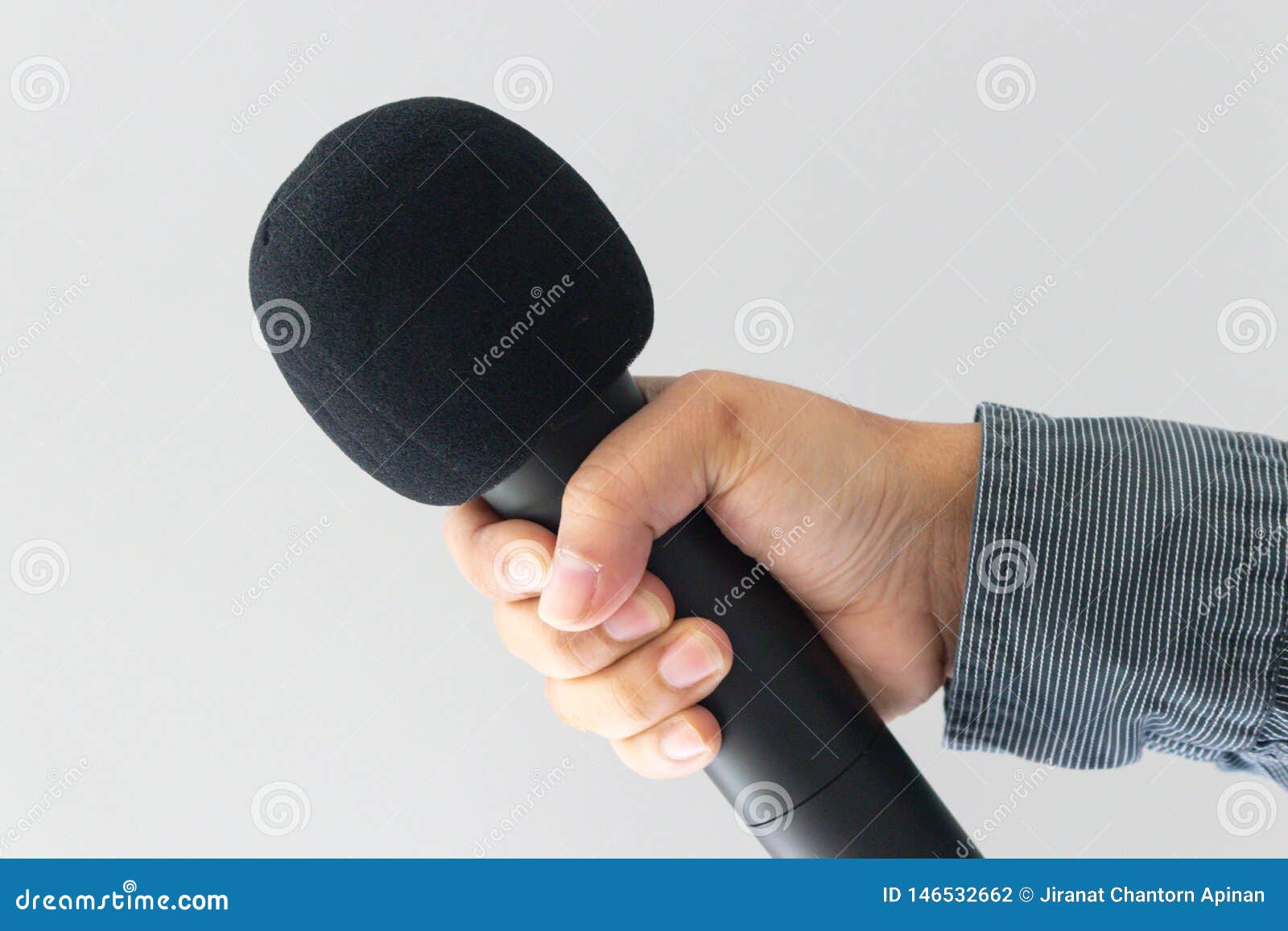 Black Microphone in a Hand of Man Stock Photo - Image of communication ...