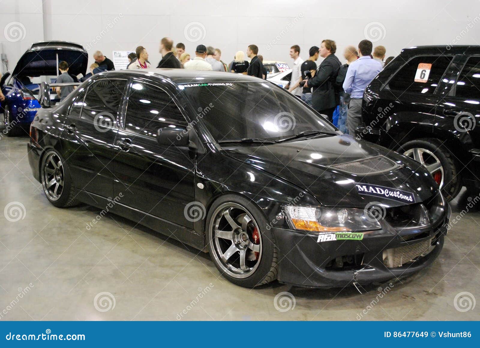 Black Mitsubishi Lancer Evolution VII in Crocus Expo 2012 Editorial ...