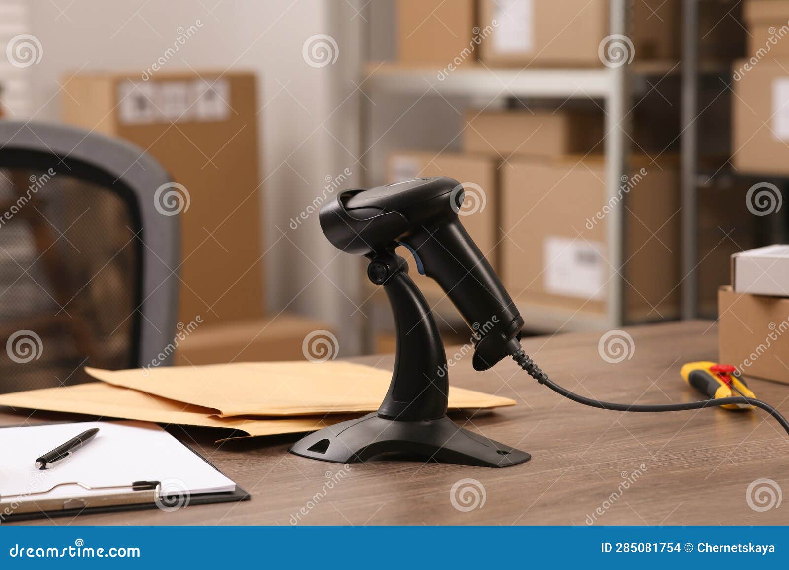 Black Modern Barcode Scanner on Wooden Table in Office. Online Store ...