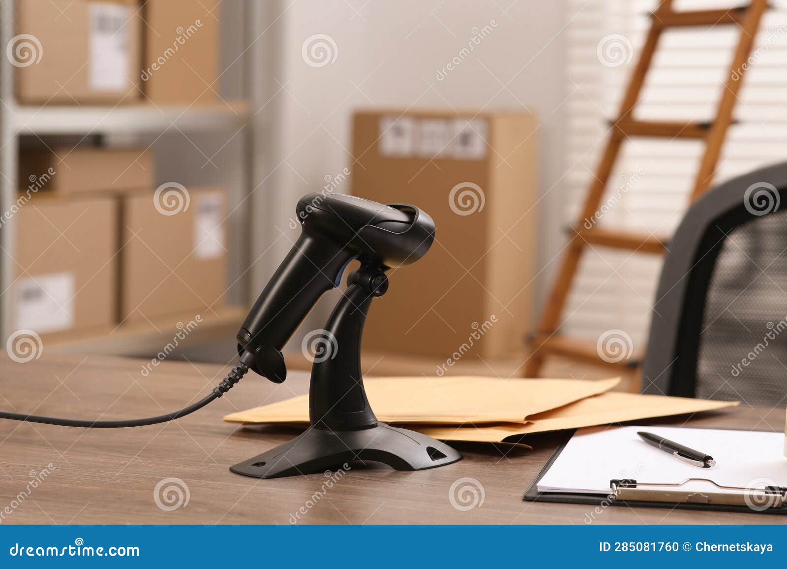 Black Modern Barcode Scanner on Wooden Table in Office. Online Store ...