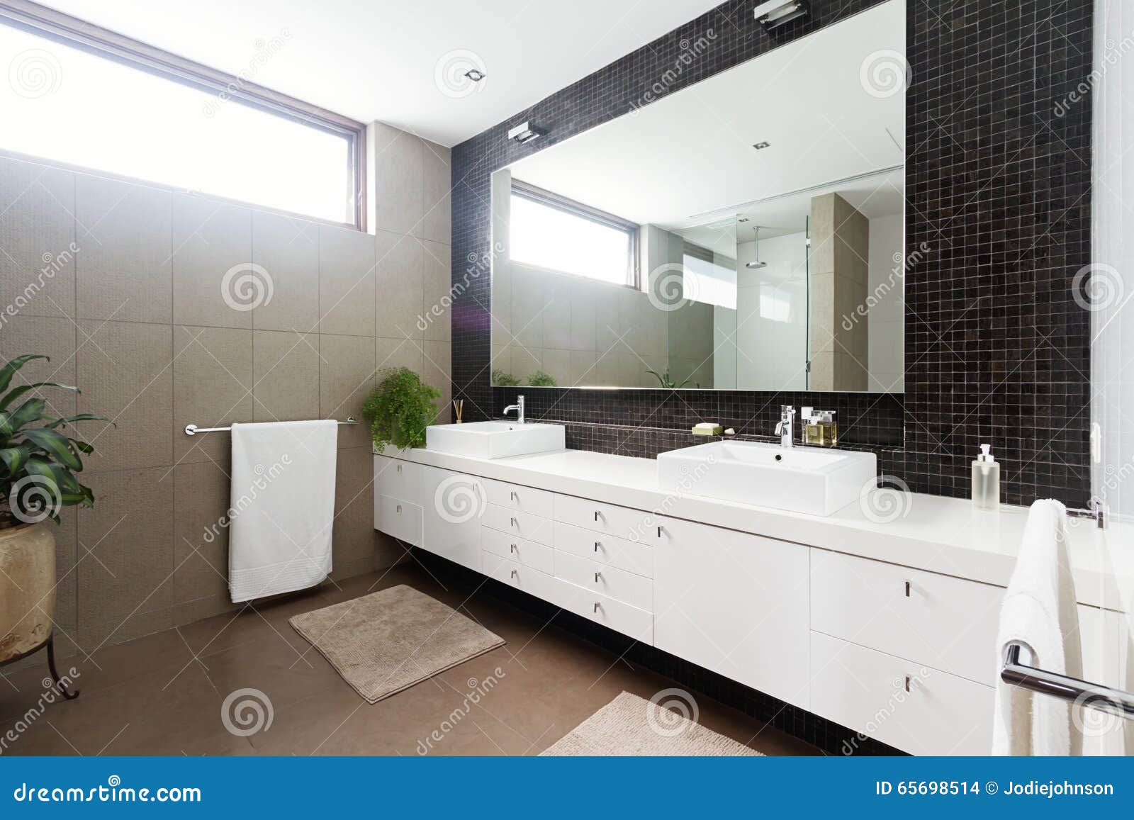 Black Mosaic Tiled Splashback and Double Basin Bathroom Stock Photo ...