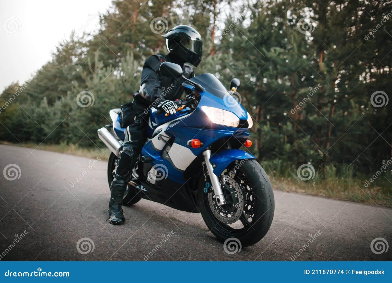 Black Motorcycle Driver in Helmet and Leather Outfit Stock Photo ...