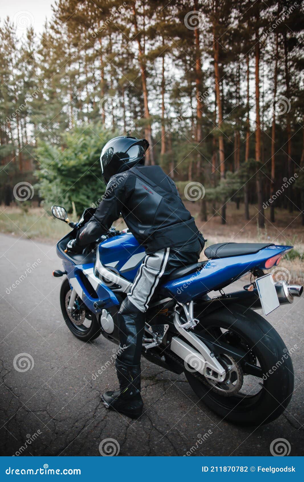 Black Motorcycle Driver in Helmet and Leather Outfit Stock Photo ...