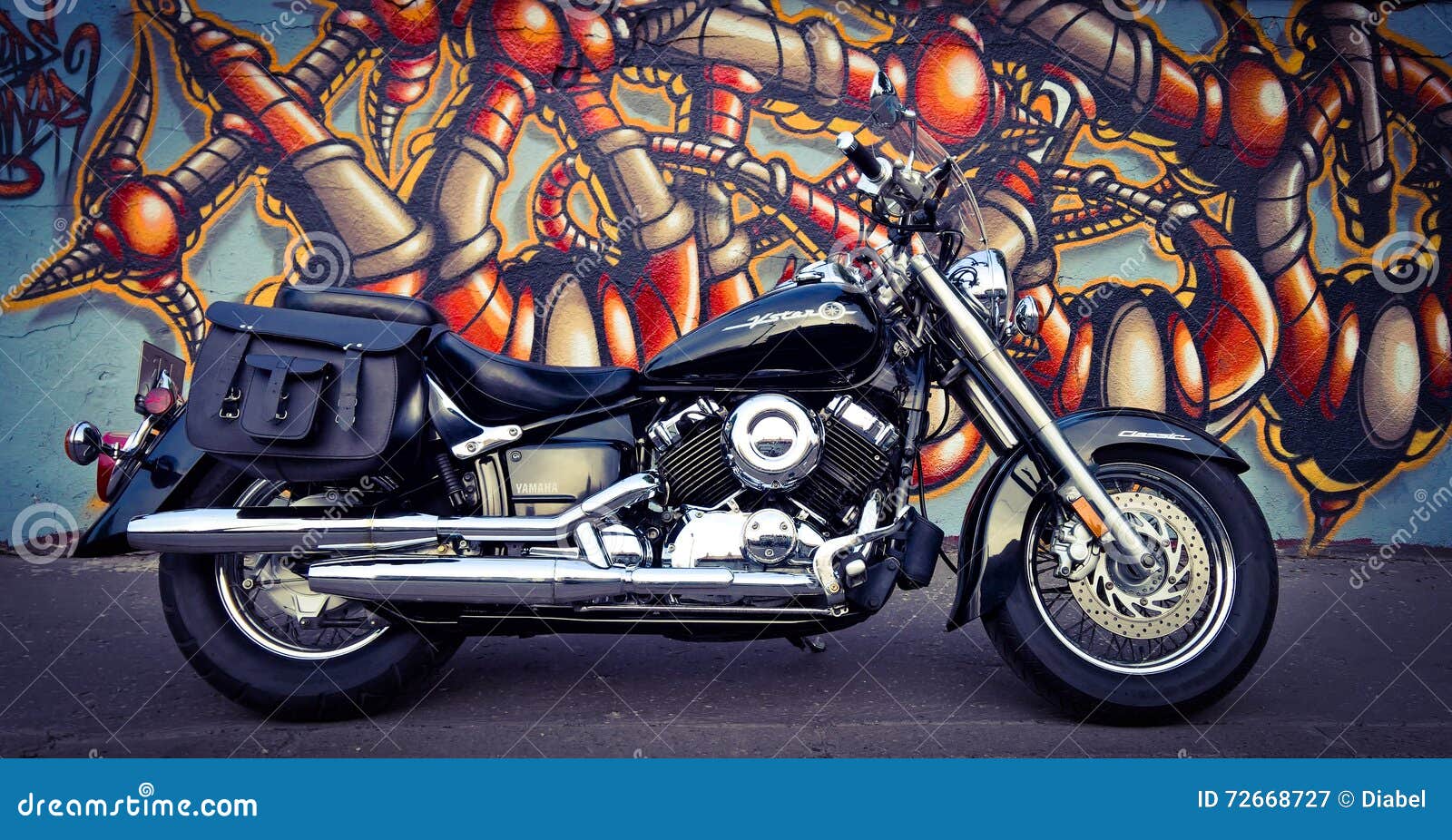 Black Motorcycle and the Graffiti Wall Editorial Photography - Image of ...