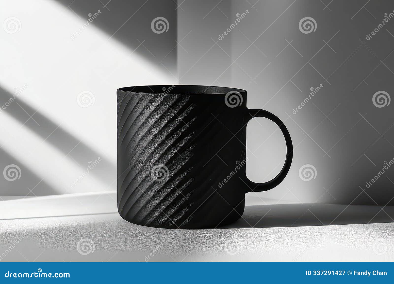 Black Mug with Diagonal Lines in Sunlight Minimalist Aesthetic Stock ...