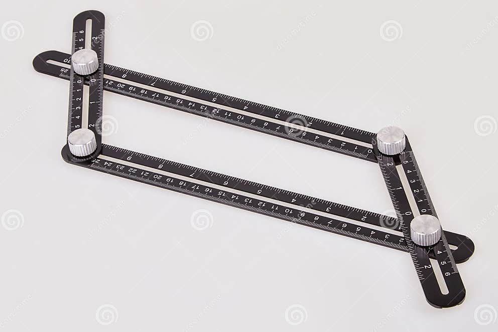 Black Multi Function Ruler Isolated on White Background. Stock Image ...