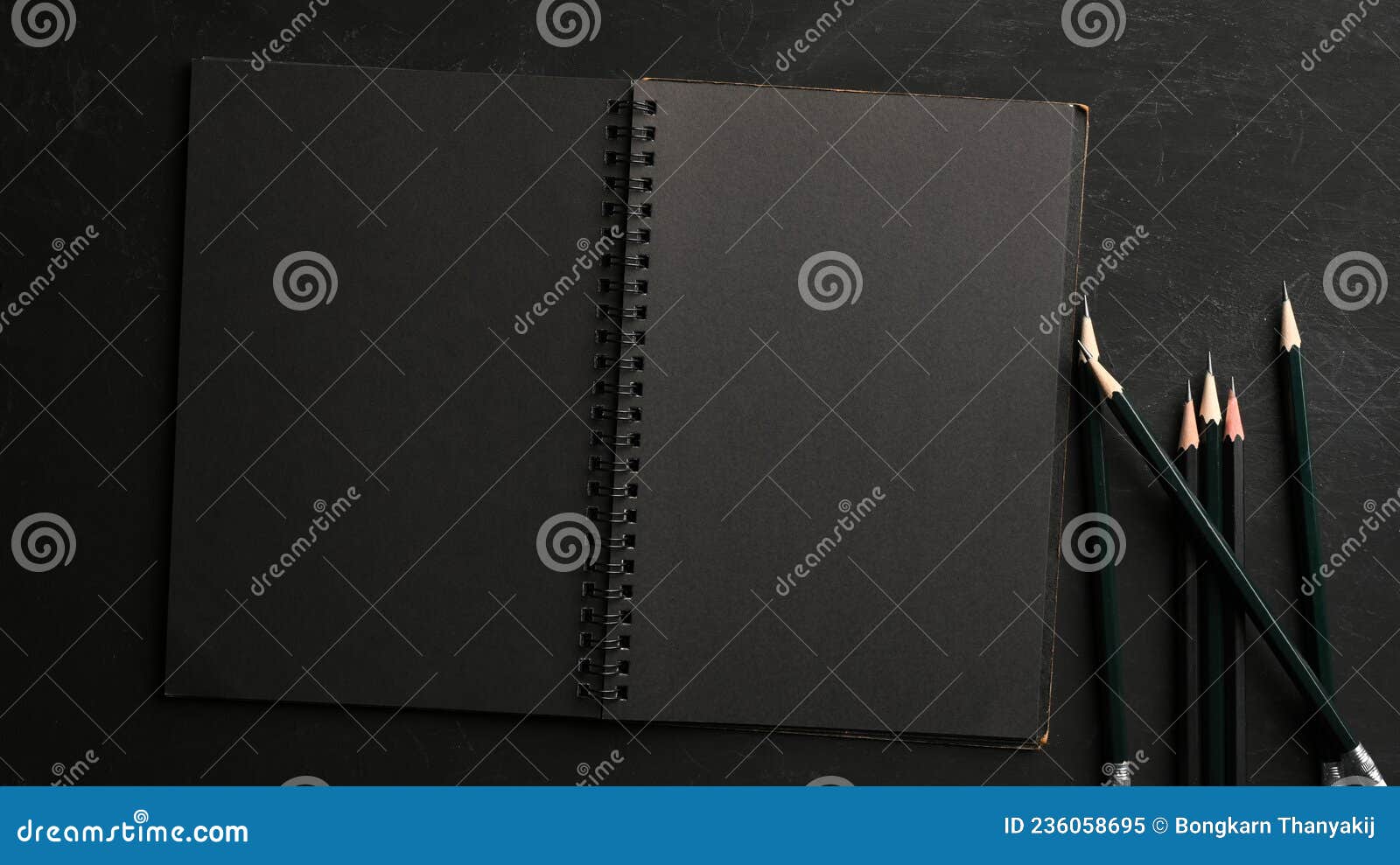 Black Notebook with Black Papers and Pencils on Study Table Stock Image ...