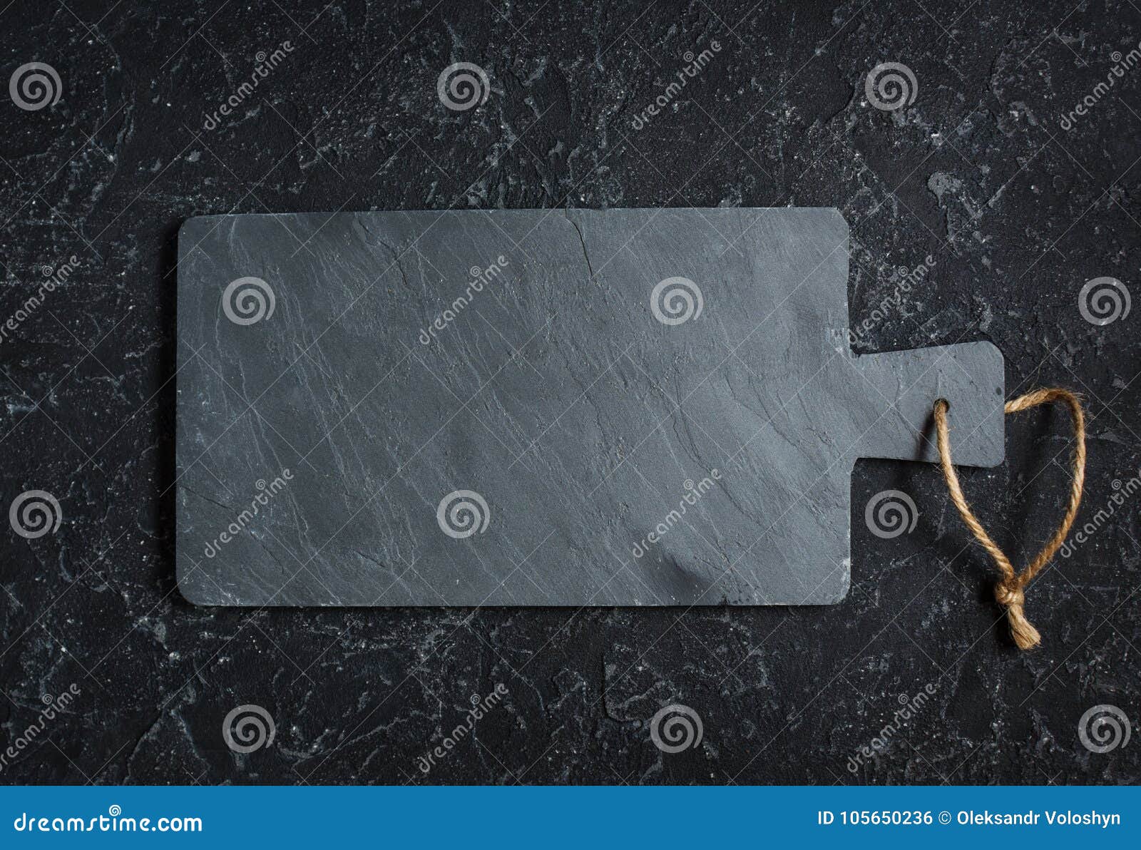 Black Old-fashioned Stone and Slate Cutting Board on Black Background ...
