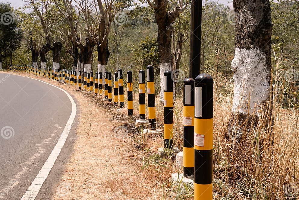 Black Orange Roadblocks Signify Sharp Bends and Ravines Stock Image ...