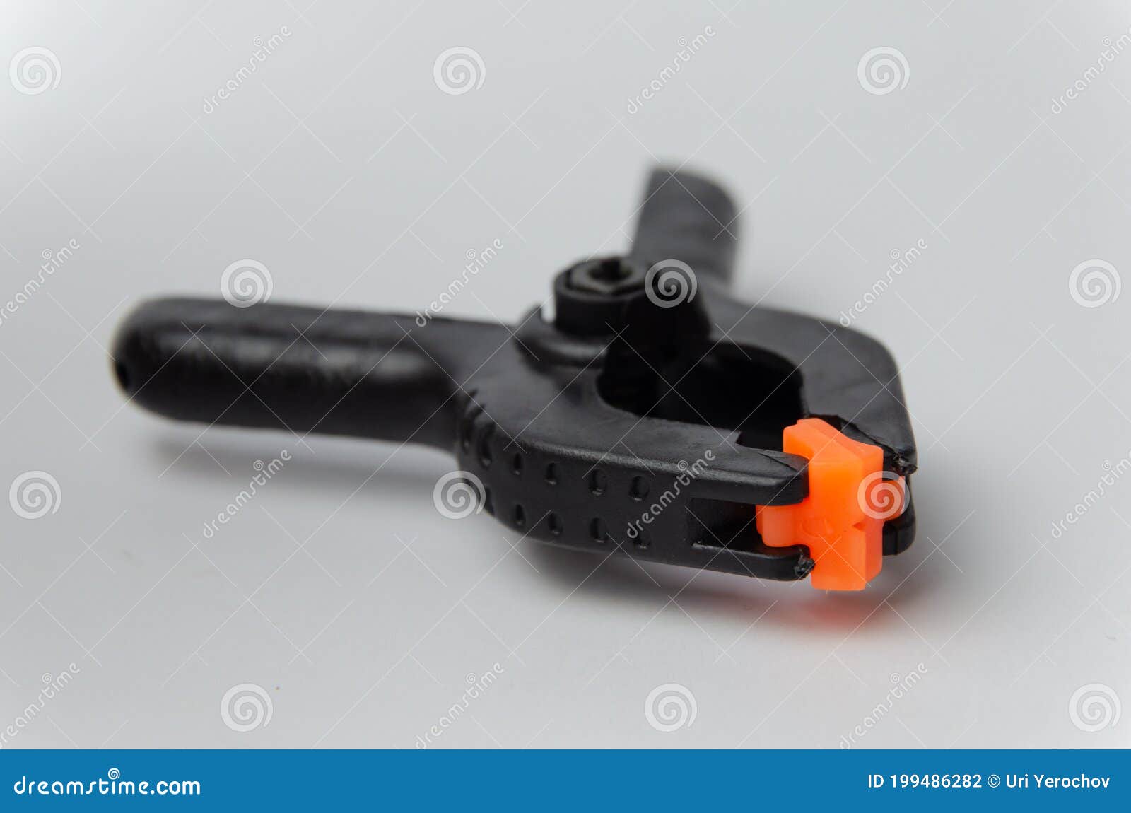 Black and Orange Spring Clamp Stock Photo - Image of instrument, strong ...