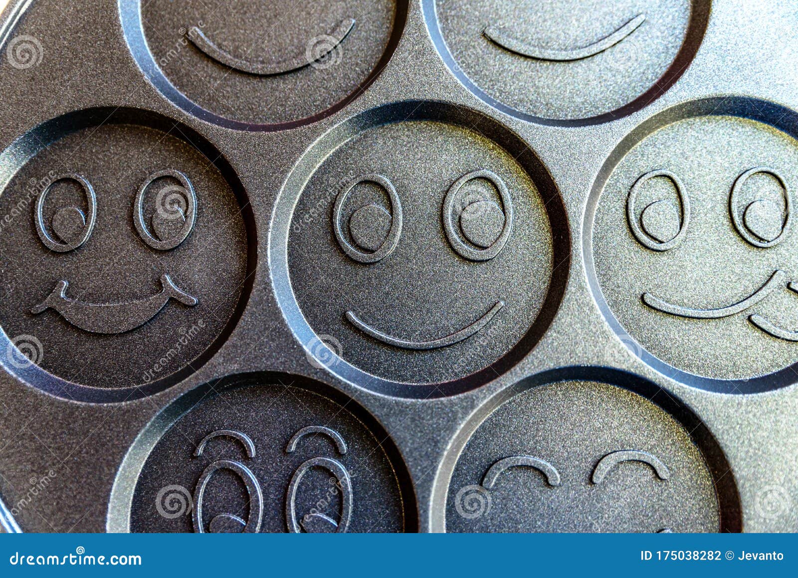 Black Pancake Smile Frying Pan on Worktop in Kitchen Stock Photo ...