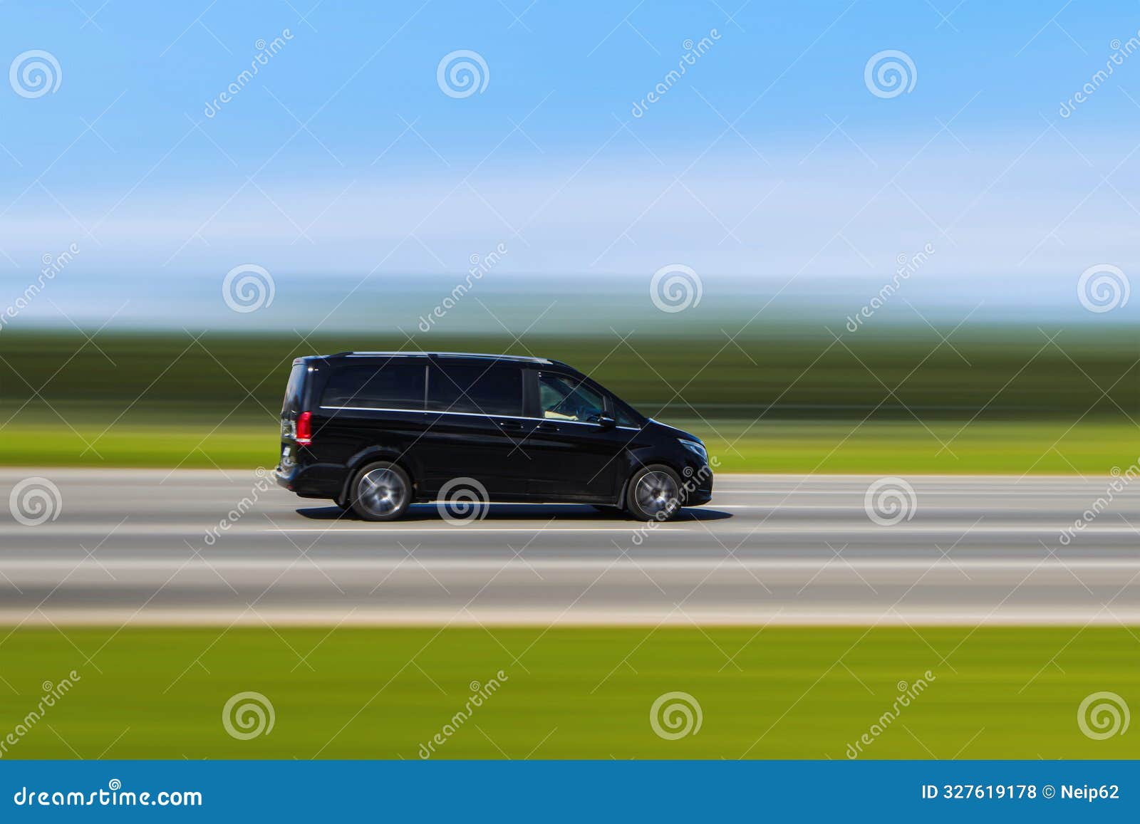 Black Passenger Minibus, Minivan is Driving on the Street with Blurred ...