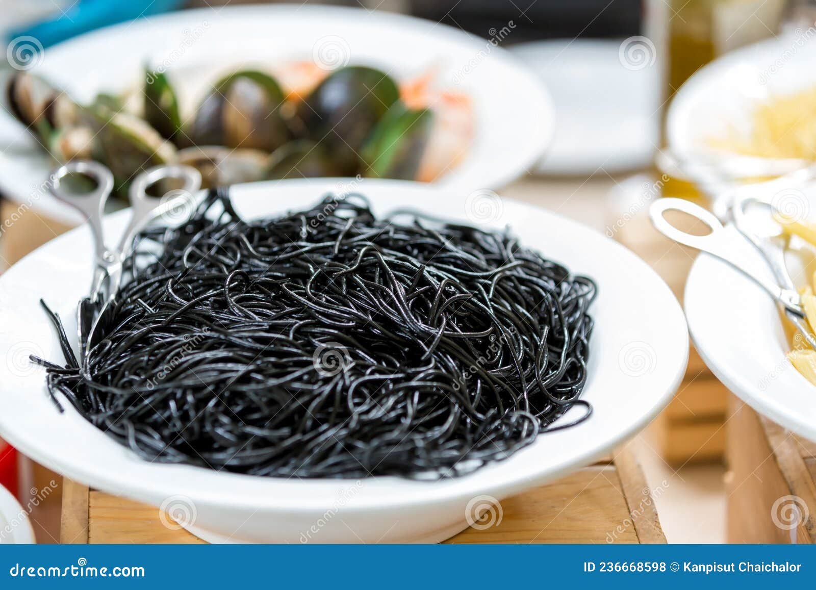 Black Pasta with Cuttlefish Ink on Plate. Black Fresh Spaghetti Pasta ...