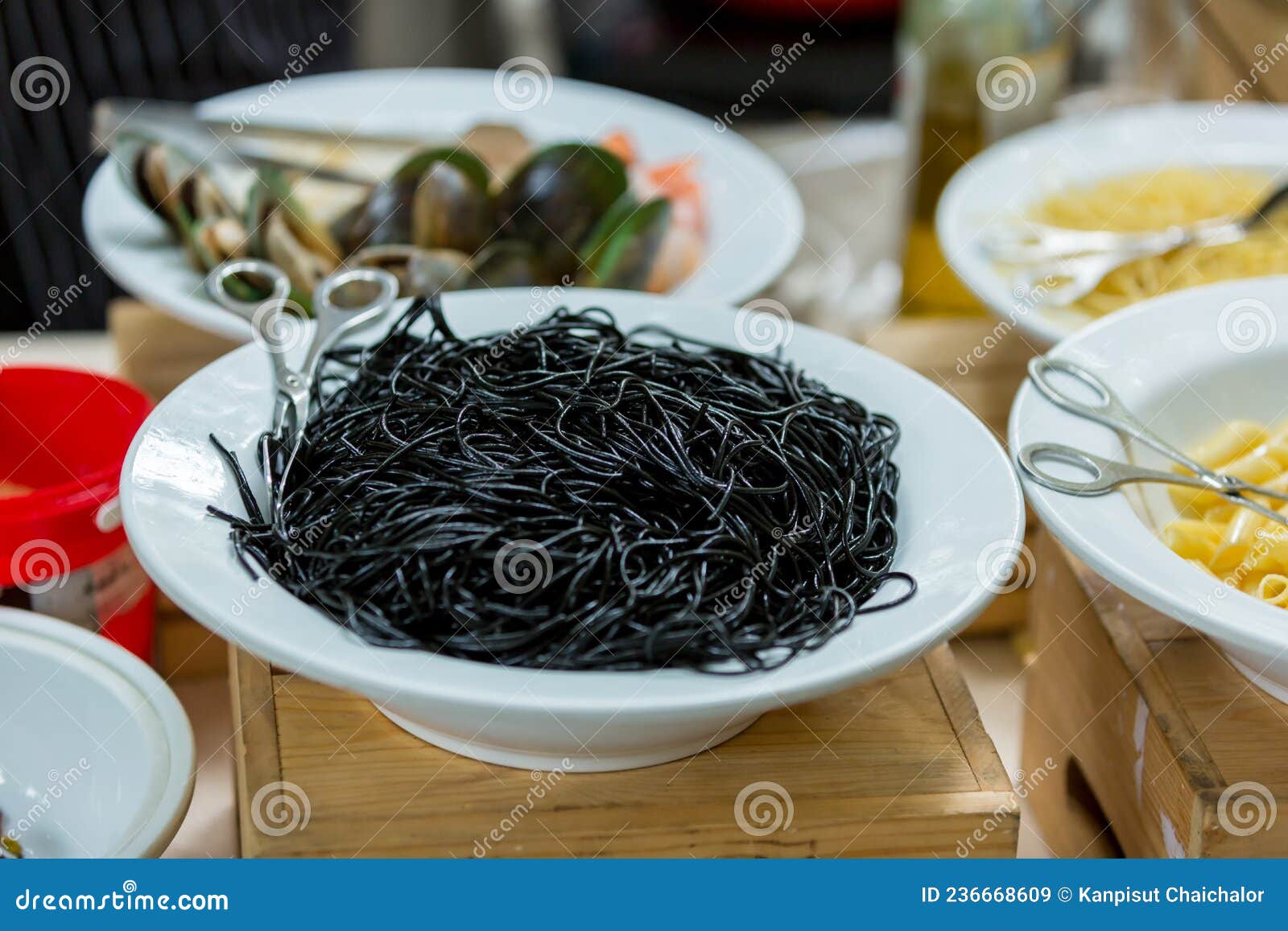 Black Pasta with Cuttlefish Ink on Plate. Black Fresh Spaghetti Pasta ...