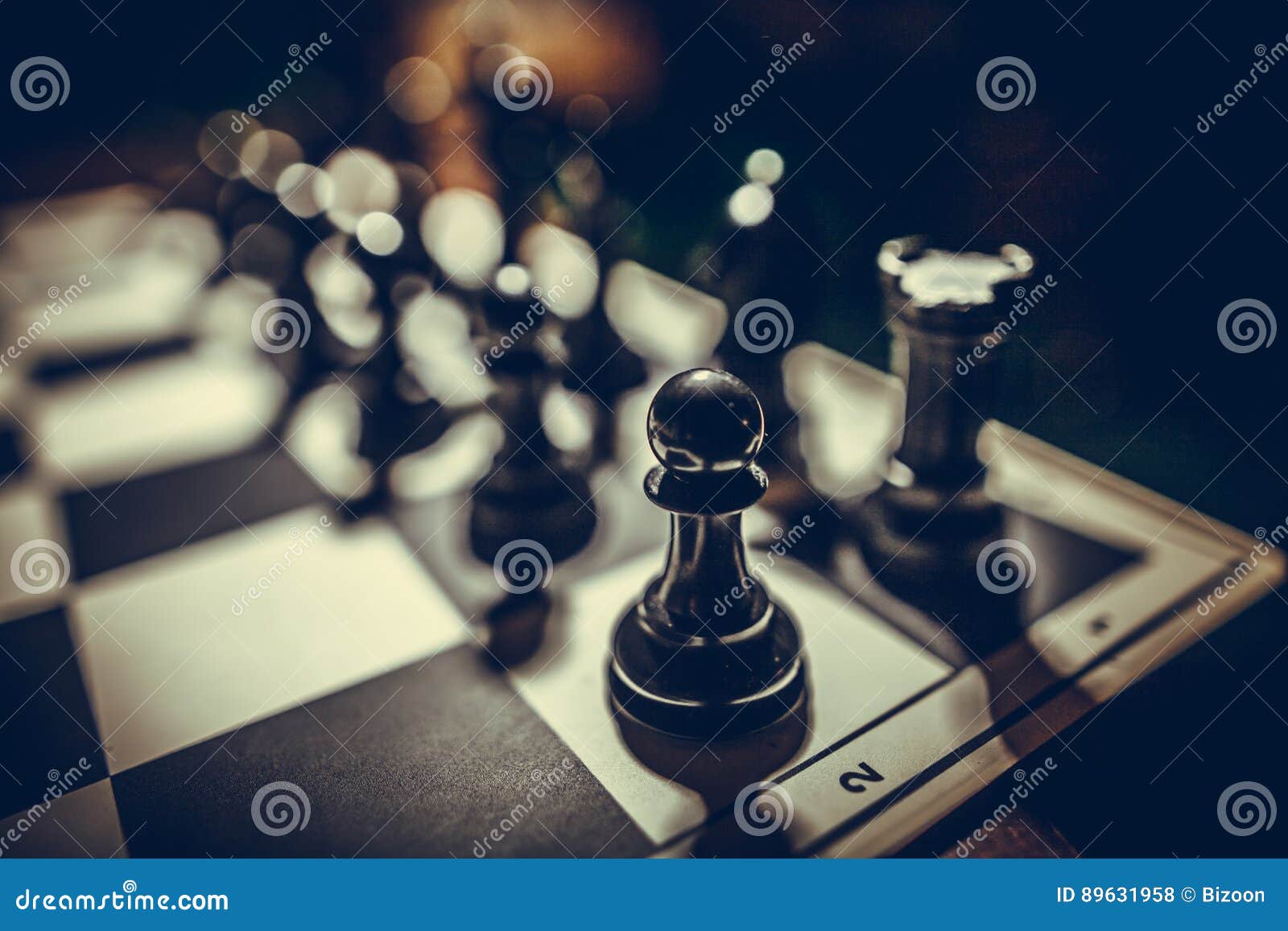 Black pawn on chess board stock photo. Image of chessboard - 89631958