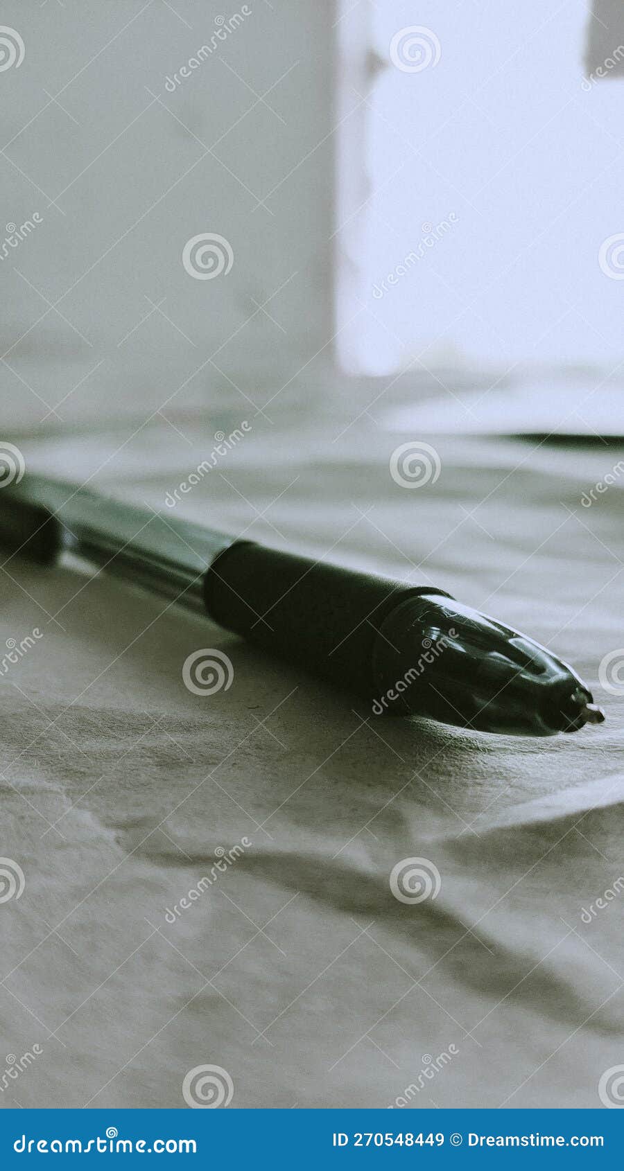 A Black Pen on a Sheet of Paper in a Classroom Stock Image - Image of ...