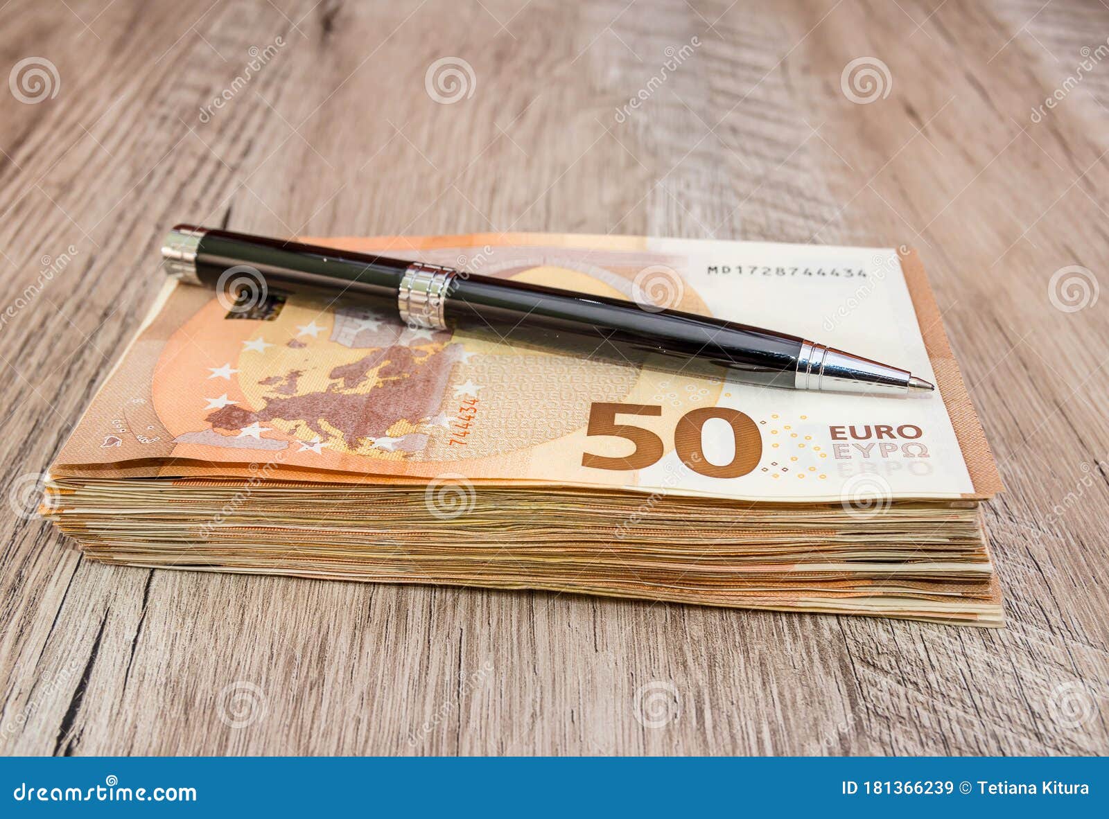 Black Pen on a Stack with Euro Banknotes Stock Image - Image of ...