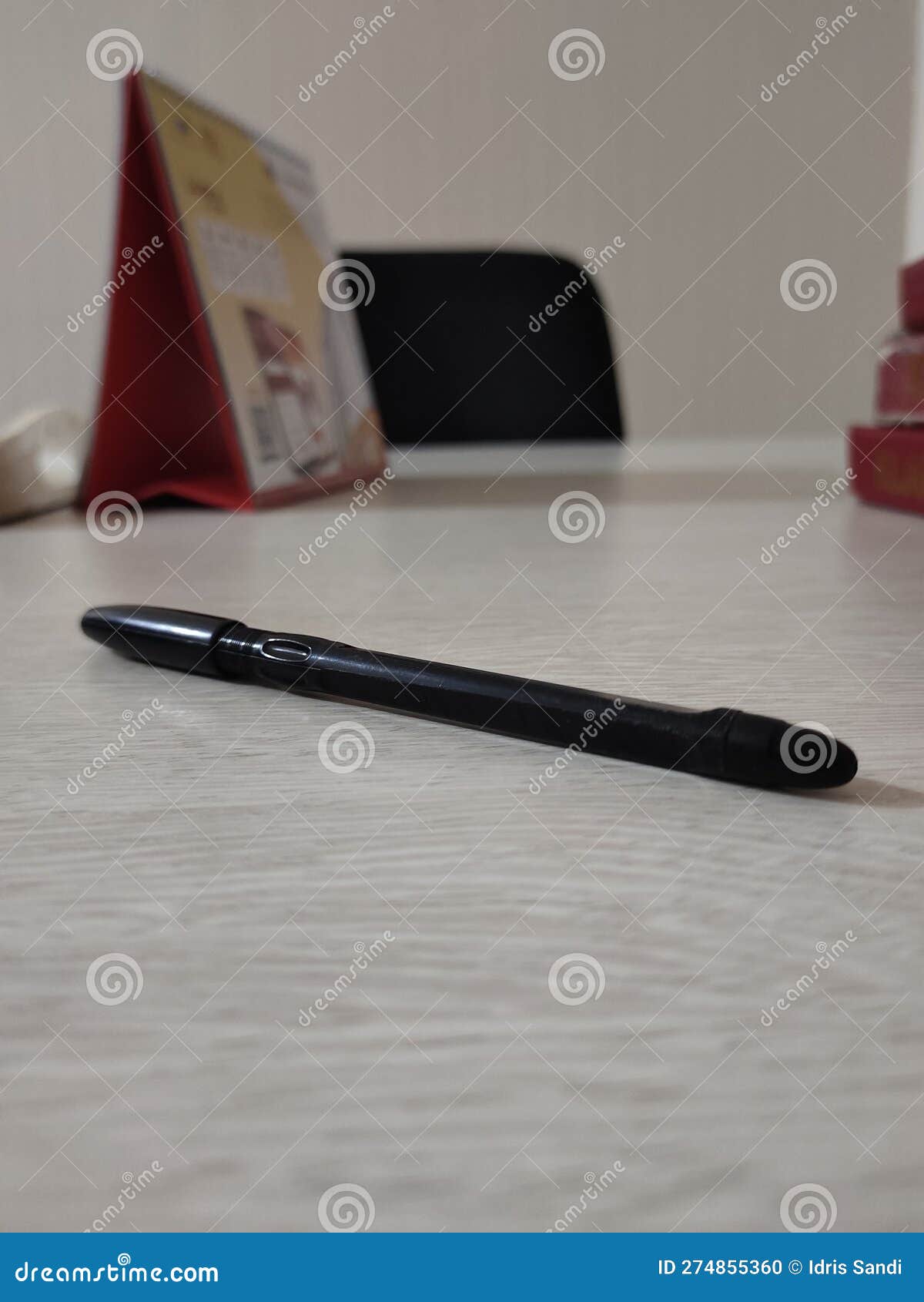 A Black Pen on the Wood Table in Office Stock Photo - Image of work ...