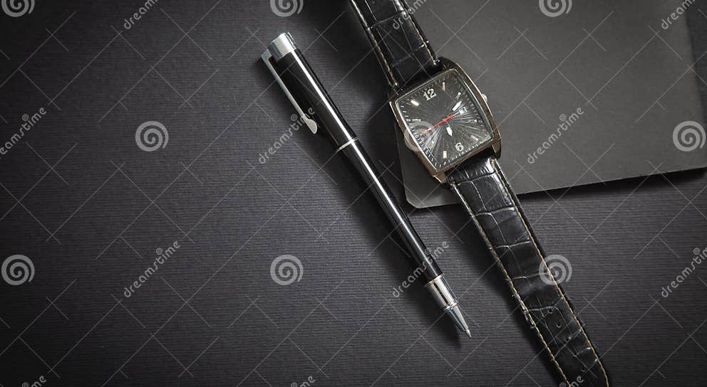 Black Pen, Wristwatch, Notepad on the Black Background Stock Image ...