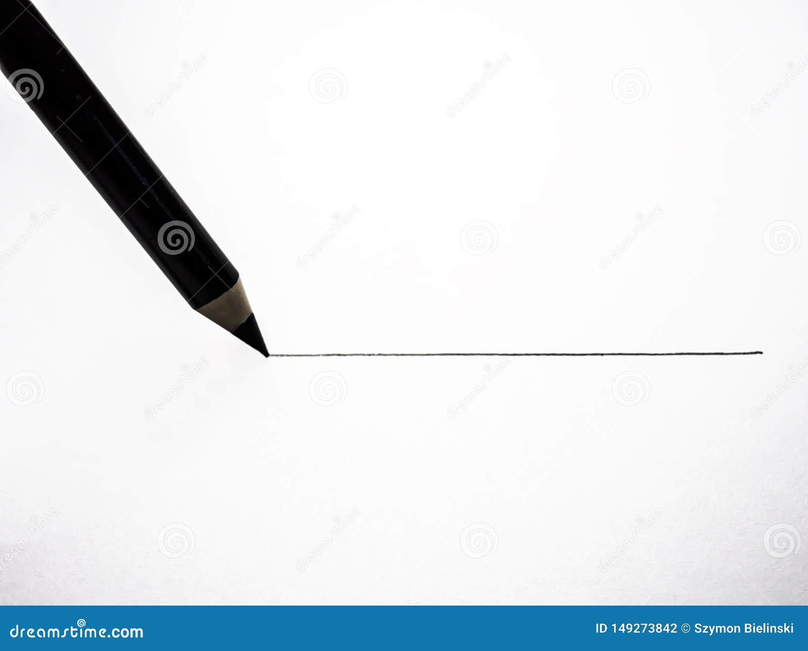 A Black Pencil Draws a Line on a White Piece of Paper Stock Photo ...
