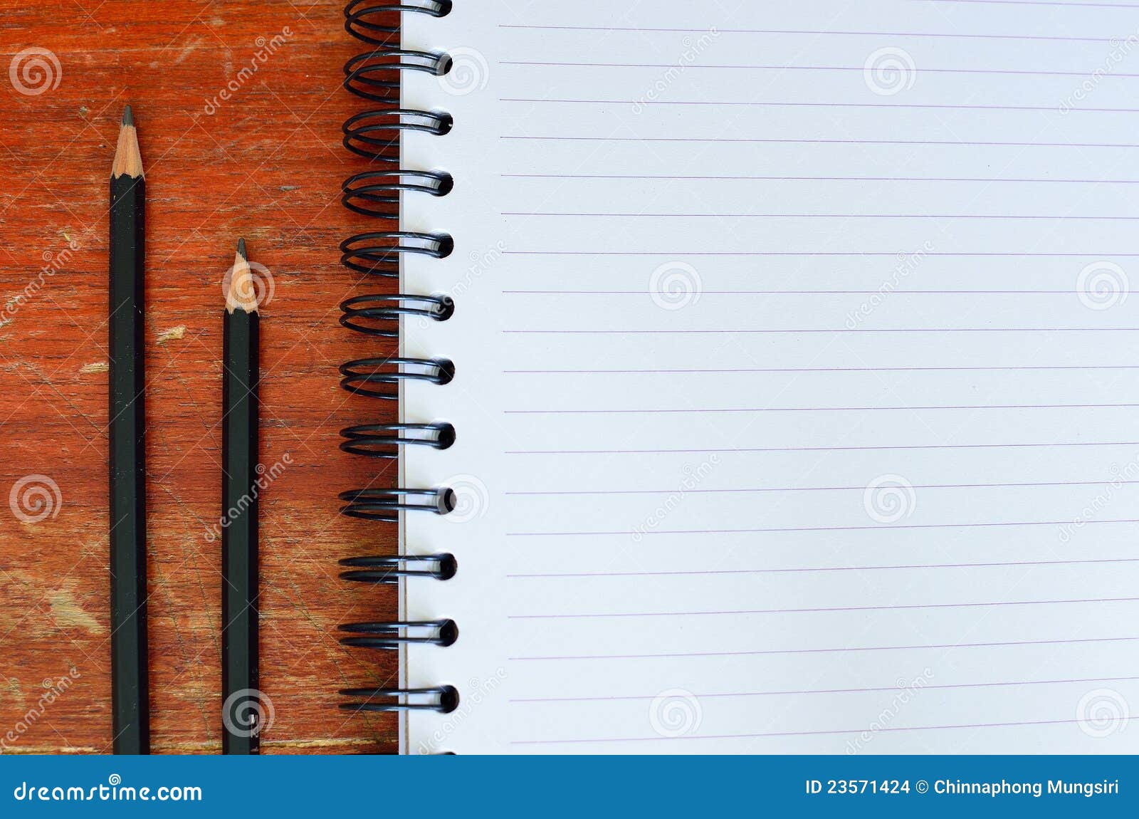 Black Pencil on White Note Book Stock Photo - Image of spiral, note ...