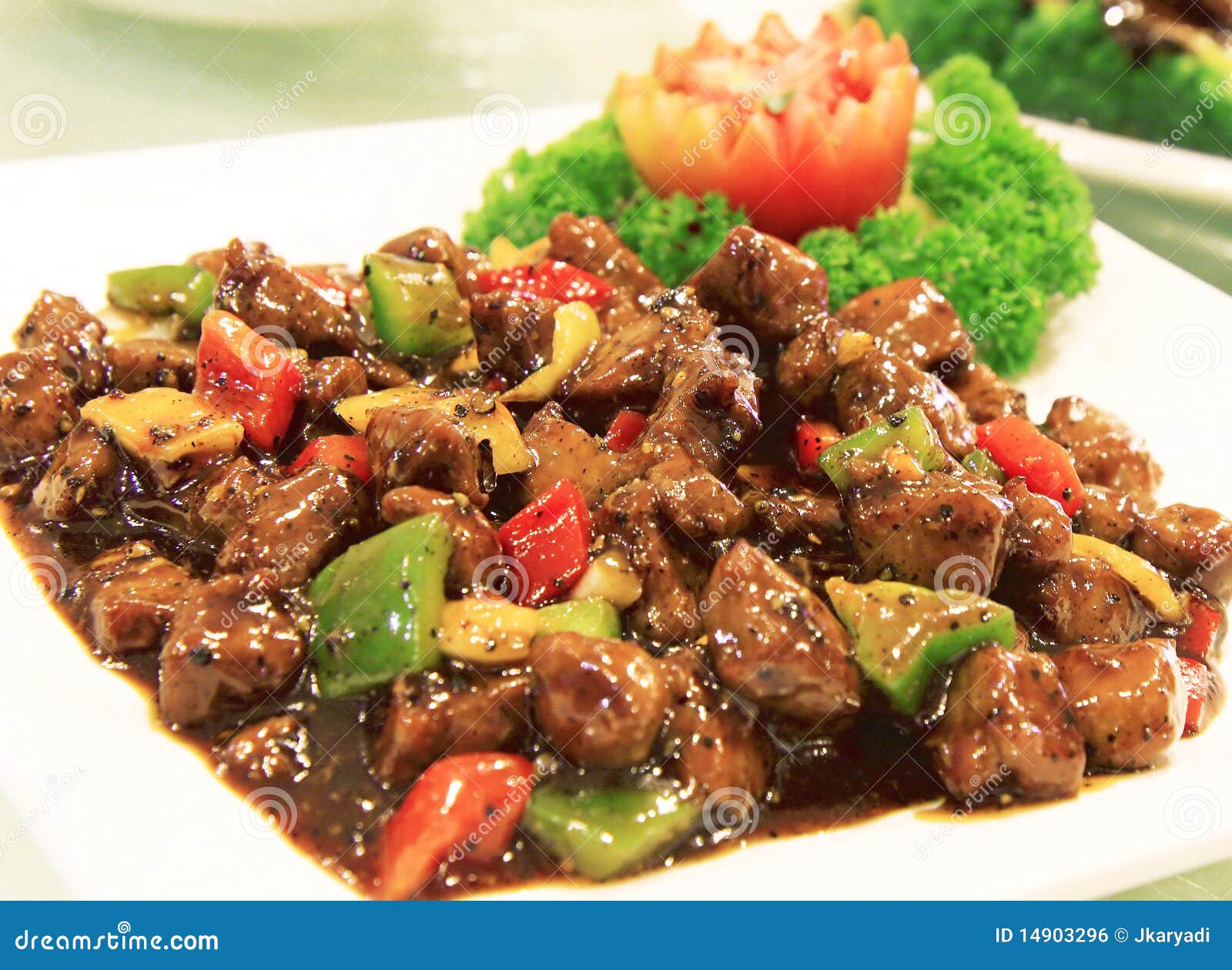 Beef With Red Pepper, Stewed In Tomato Sauce Garnished With A Mixture ...