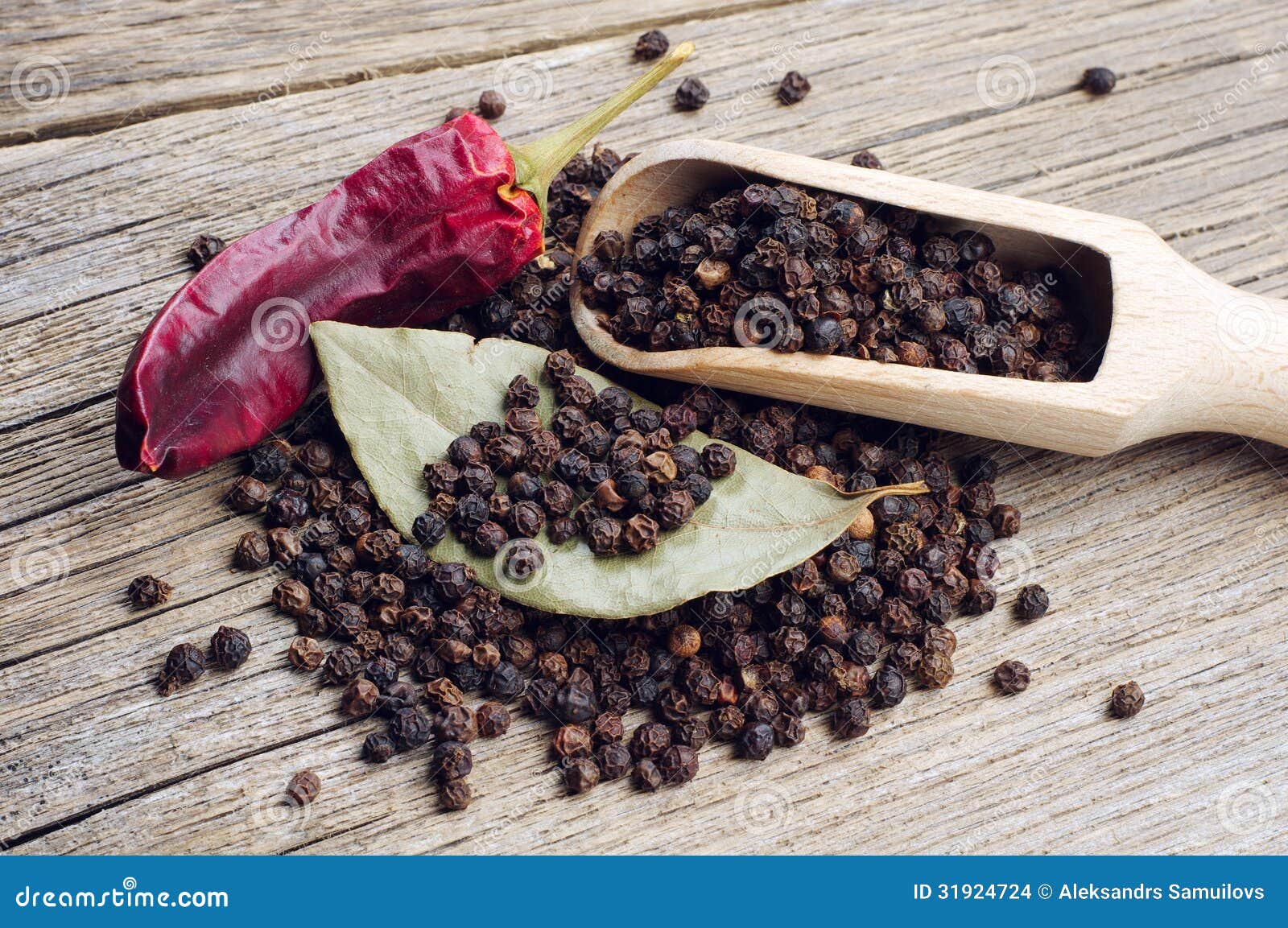 Black Pepper, Pod Chili and Bay Leaf Stock Photo - Image of textured ...