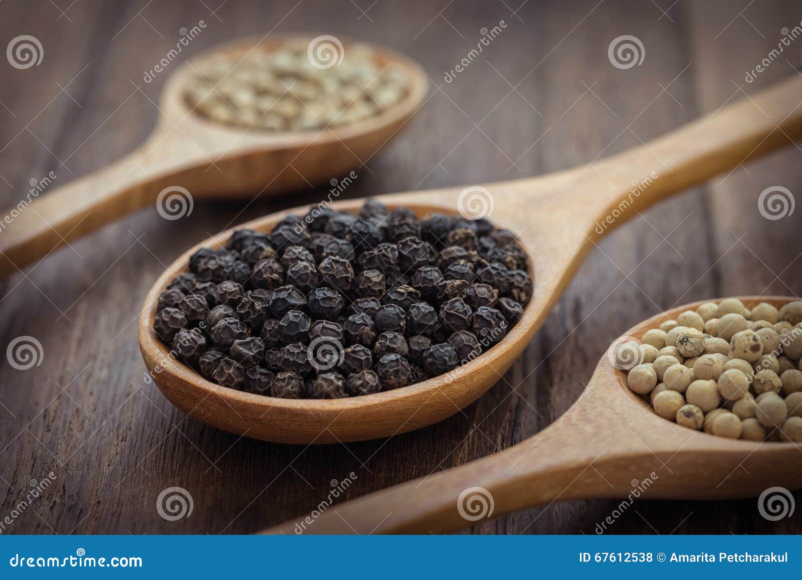 Black Pepper and White Pepper on Wooden Spoon Stock Photo - Image of ...
