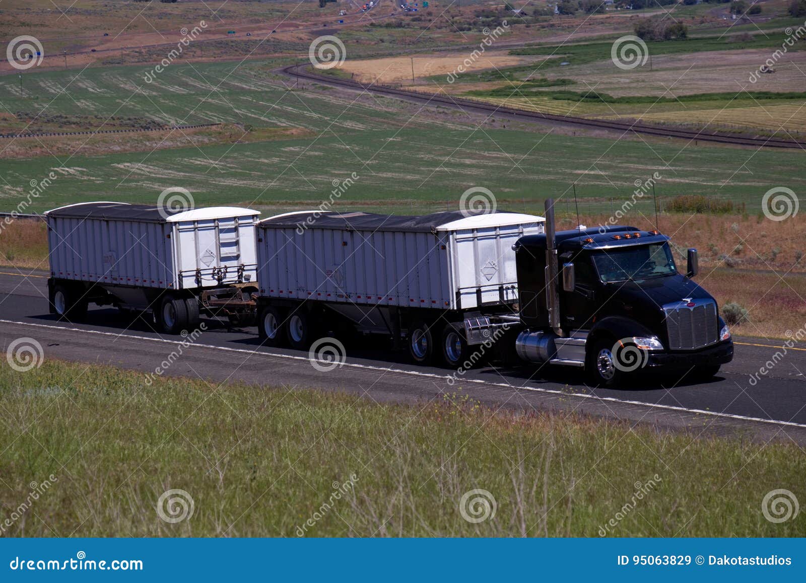 Black Peterbilt / Double Grain Trailers Stock Image - Image of commerce ...