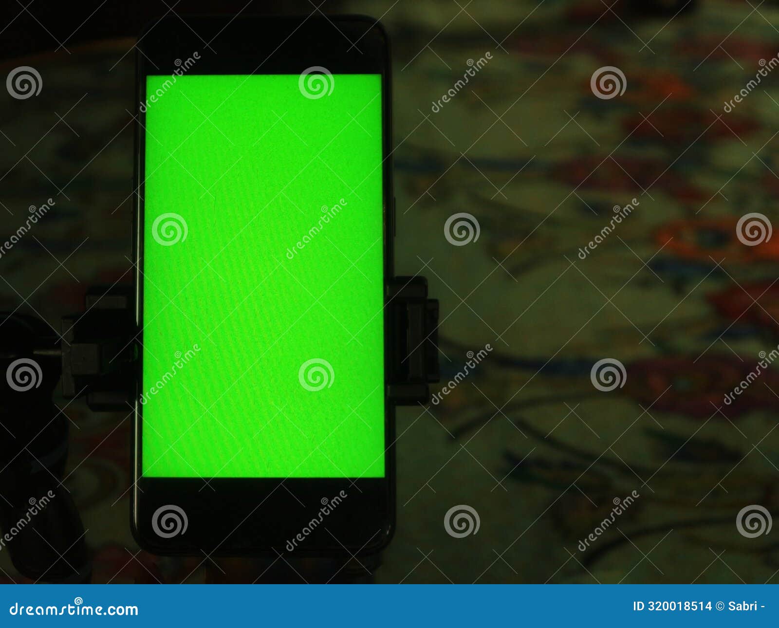 Black Phone with Green Screen. Stock Photo - Image of lighting, glass ...