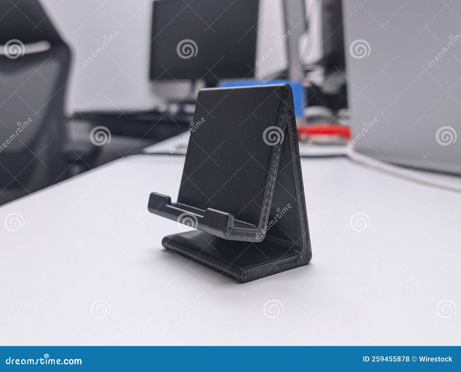 Black Phone Stand on an Office Table Stock Photo - Image of computer ...