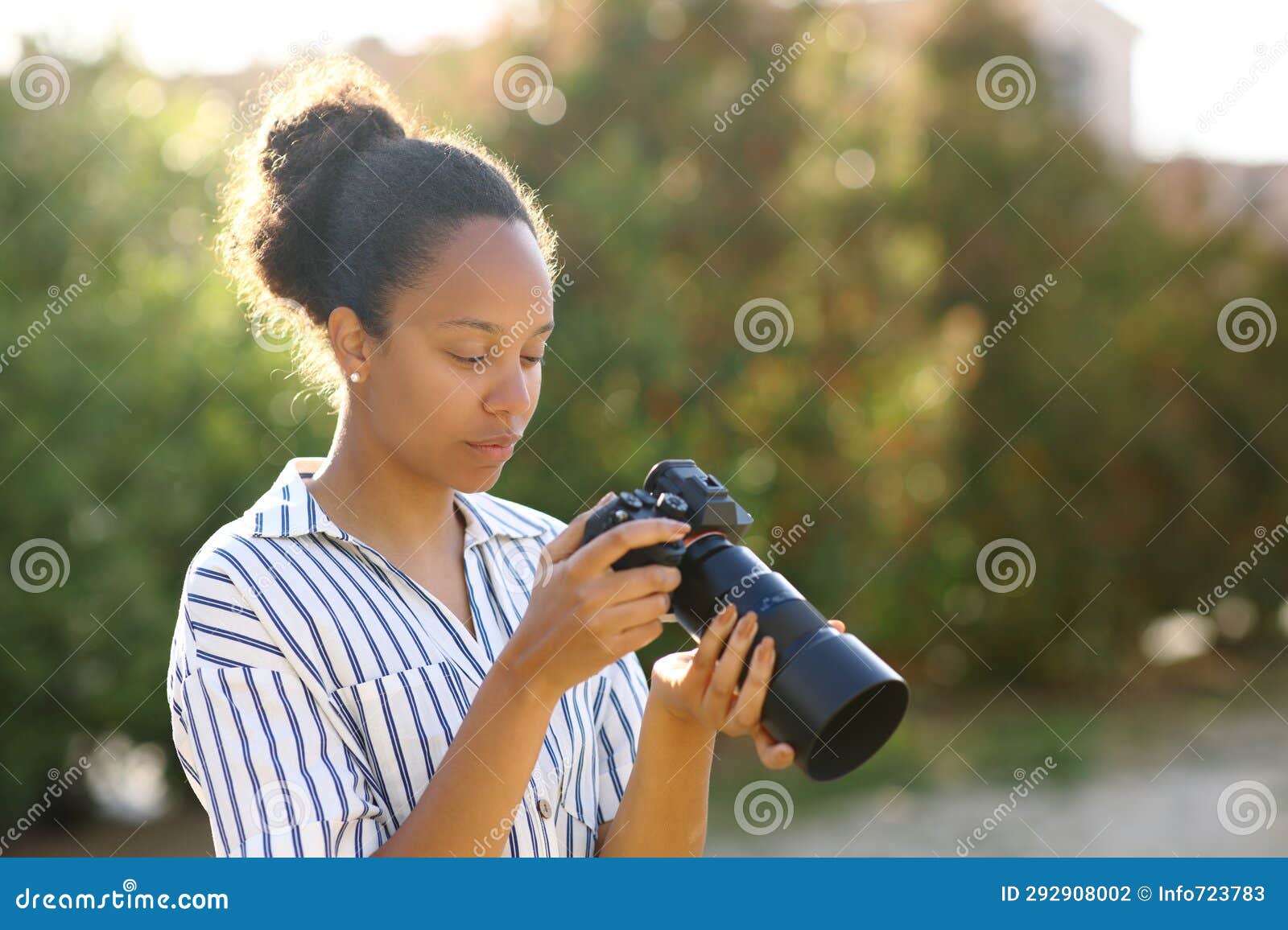 Black Photographer Checking Result on Camera Stock Photo - Image of ...