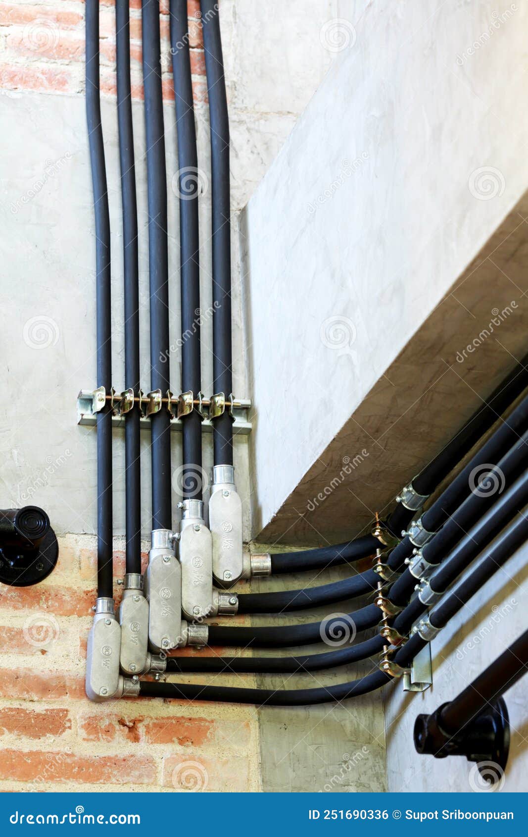 Pipeline on the wall stock photo. Image of outlet, bolt - 251690336