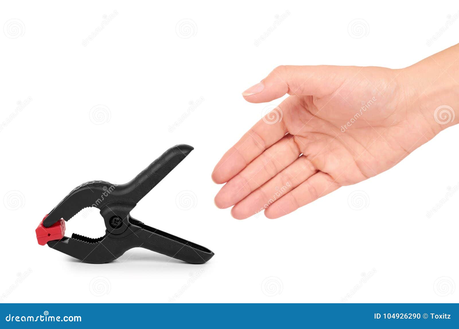 Black Plastic Clamp in Hand Isolated on White Background Stock Photo ...