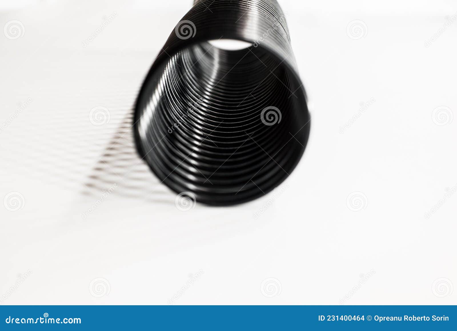 Black Plastic Coil Spring on White Background Stock Photo - Image of ...