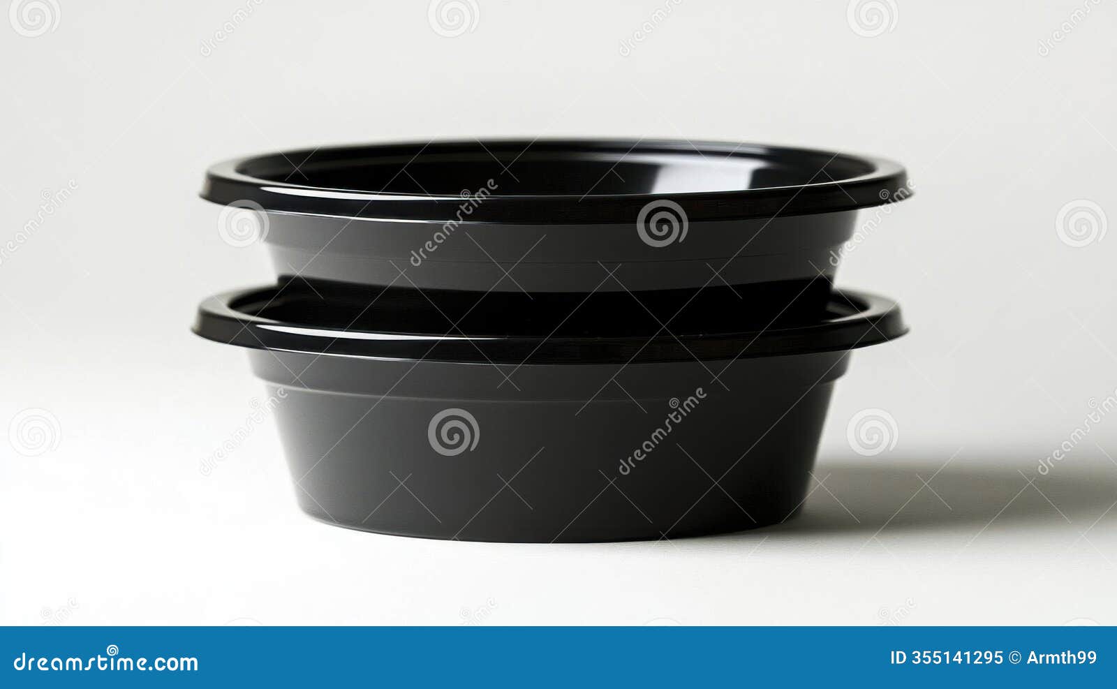 Black Plastic Containers for Food on a White Background. Side View ...