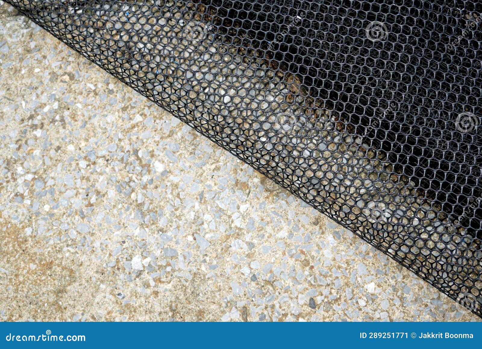 A Black Plastic Net on the Cement Floor, Abstract Background and ...