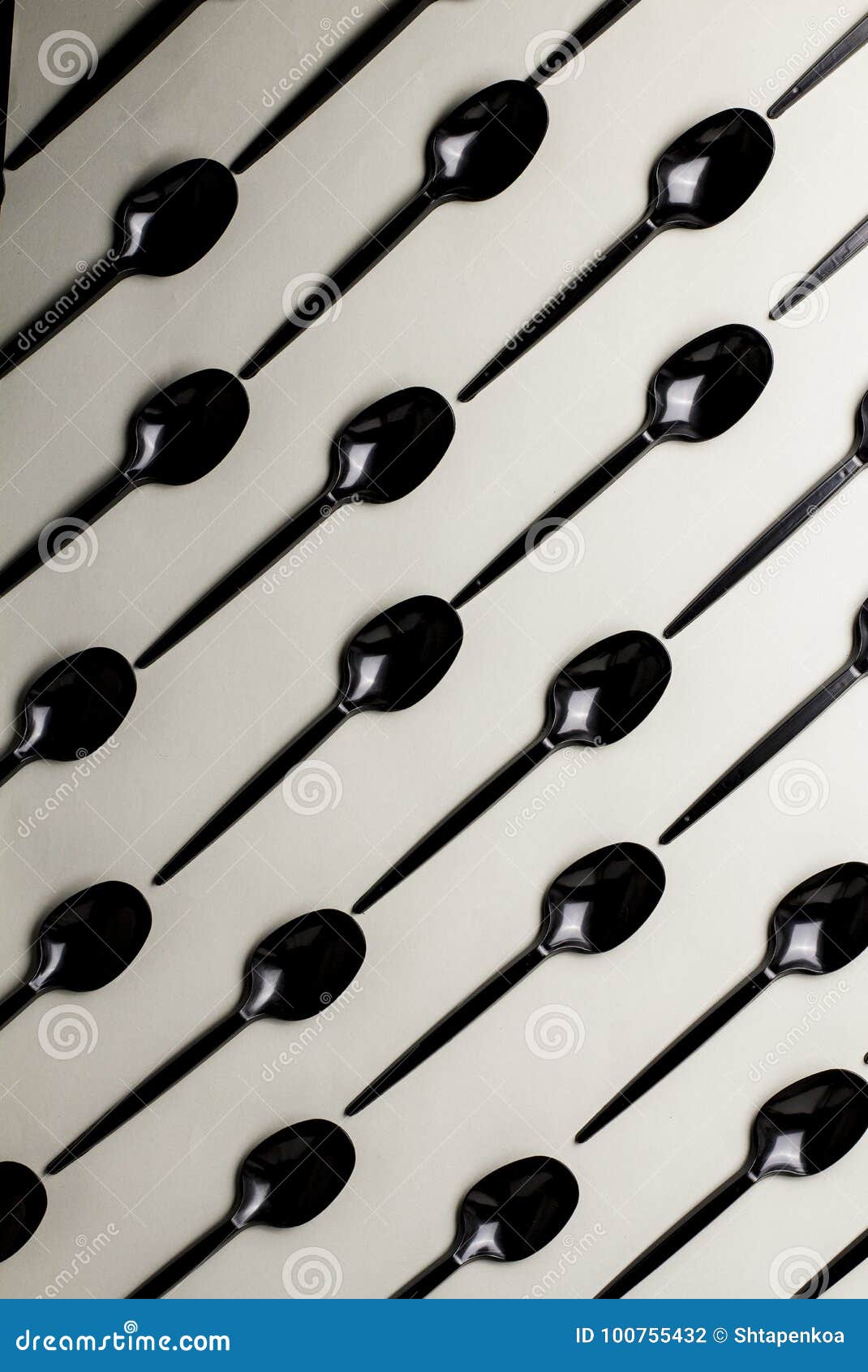 Black Plastic Spoons on a Gray Background Stock Photo - Image of human ...