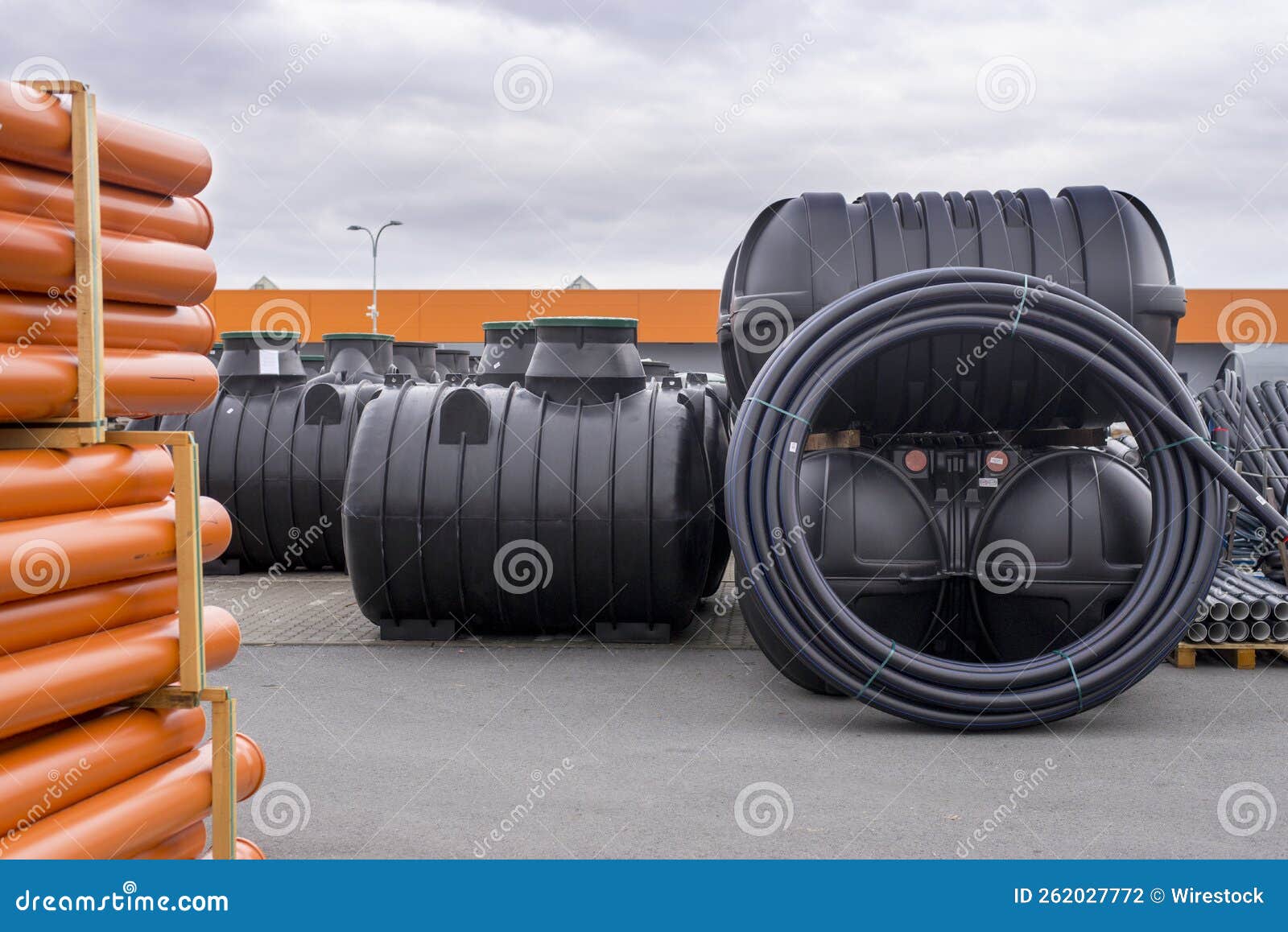 Black Plastic Water Storage Tanks on Sale Stock Photo - Image of ...