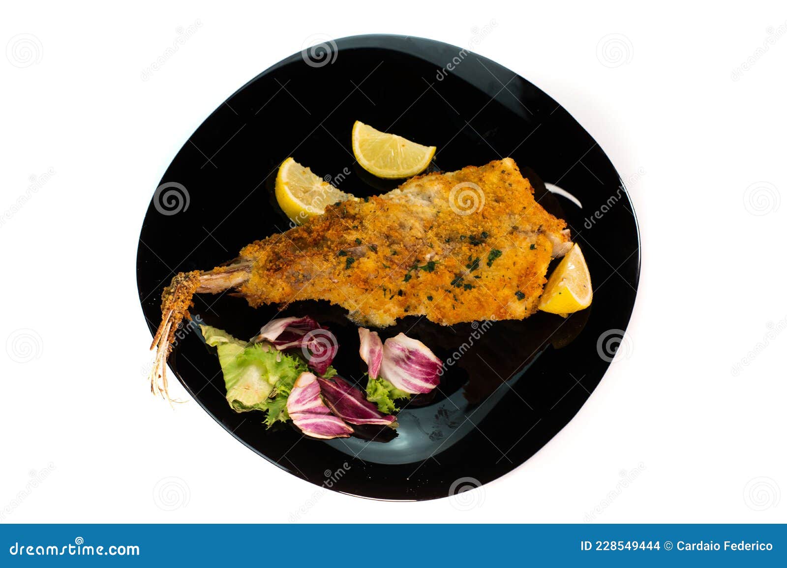 Black Plate with Breaded Monkfish Stock Photo - Image of dish, green ...