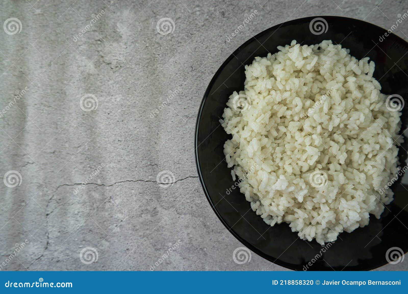 Black Plate with Cooked Rice on the Table Stock Photo - Image of ...