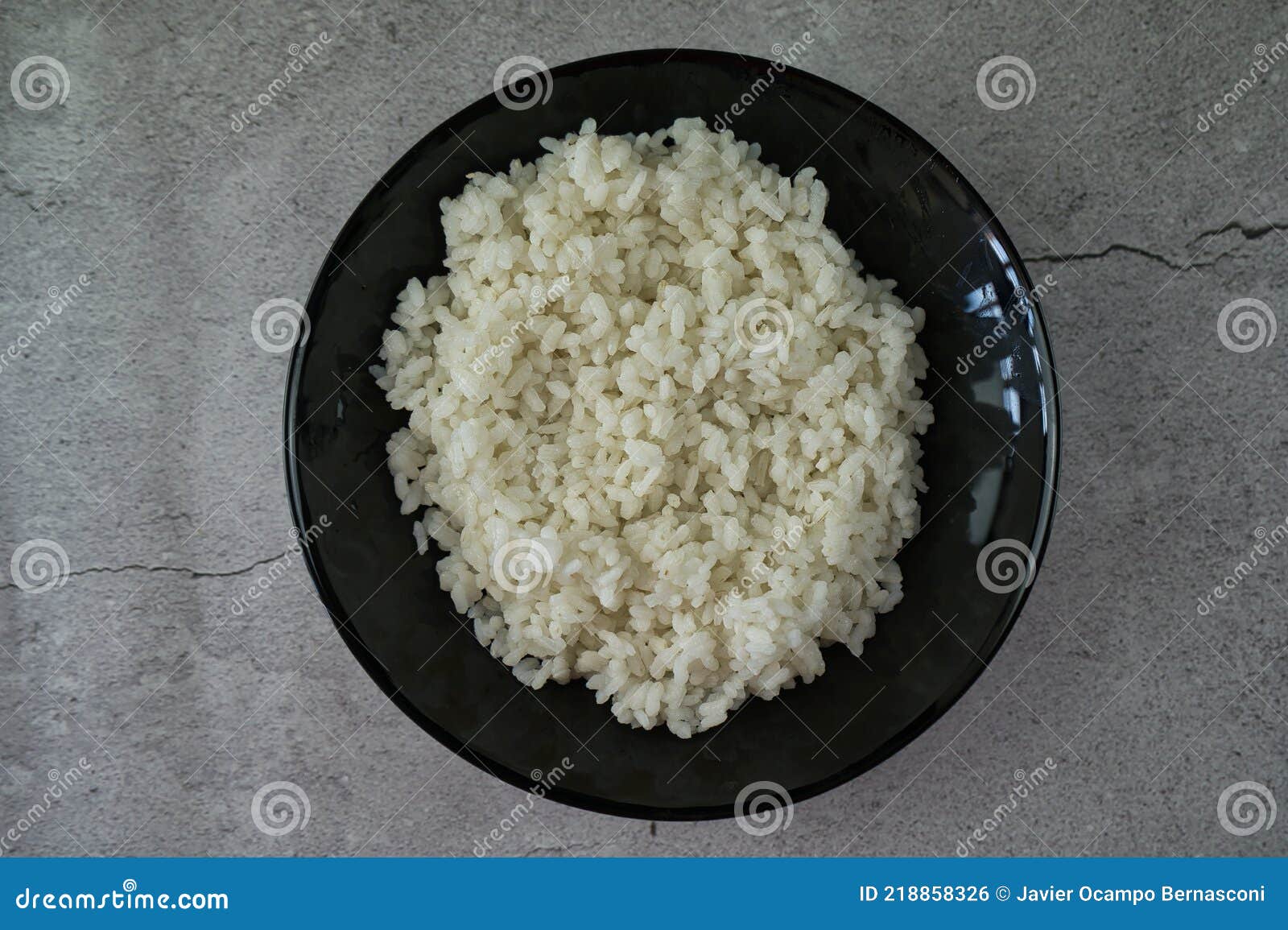 Black Plate with Cooked Rice on the Table Stock Photo - Image of ...