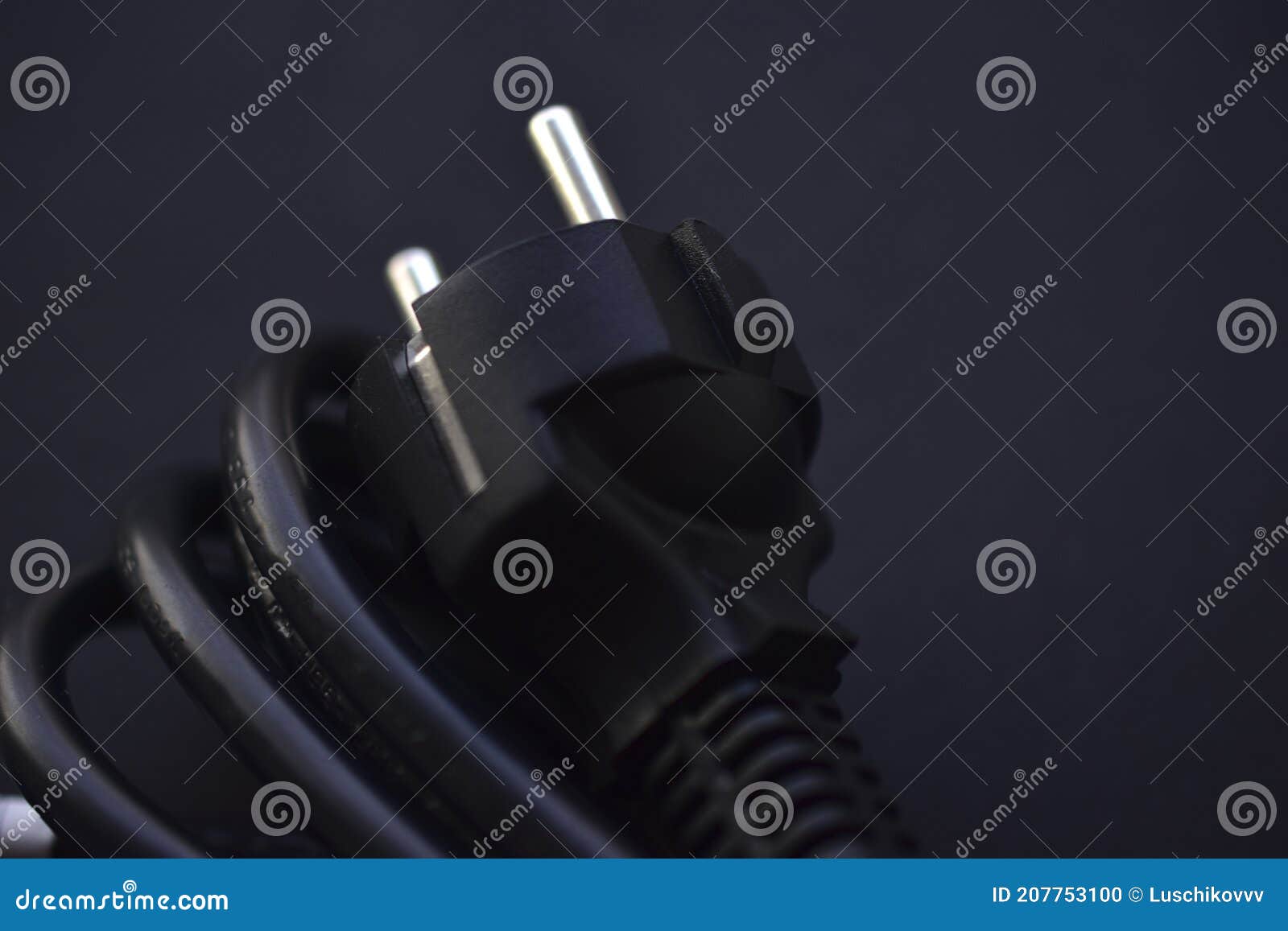 Black Plug of the Computer Power Cable on a Black Background Stock ...