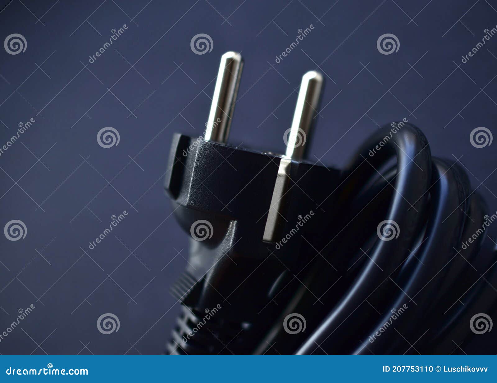 Black Plug of the Computer Power Cable on a Black Background Stock ...