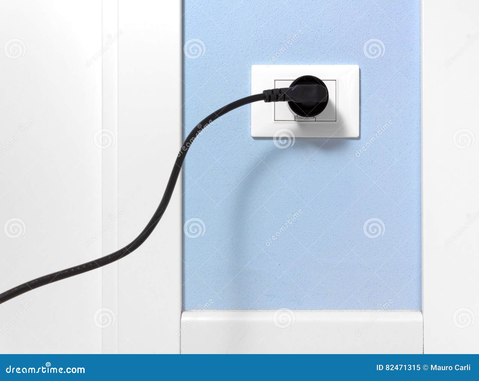 Black Plug in a Wall Socket on a Blue Wall Stock Image - Image of ...