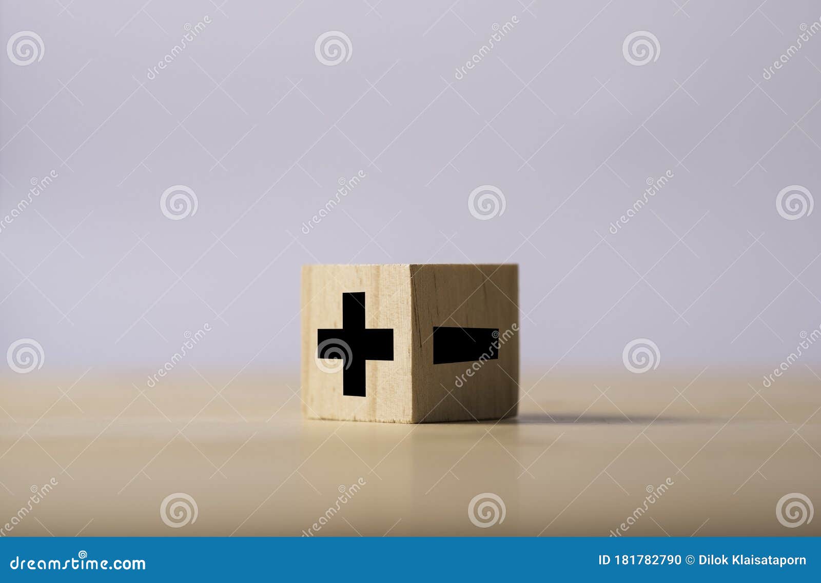 Black of Plus and Minus Sign in Opposite Side of Wooden Cube Stock ...