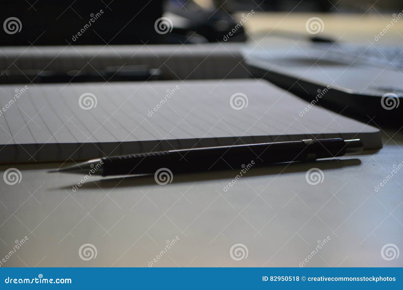 Black Point Pen Beside Ruled Paper Picture. Image: 82950518