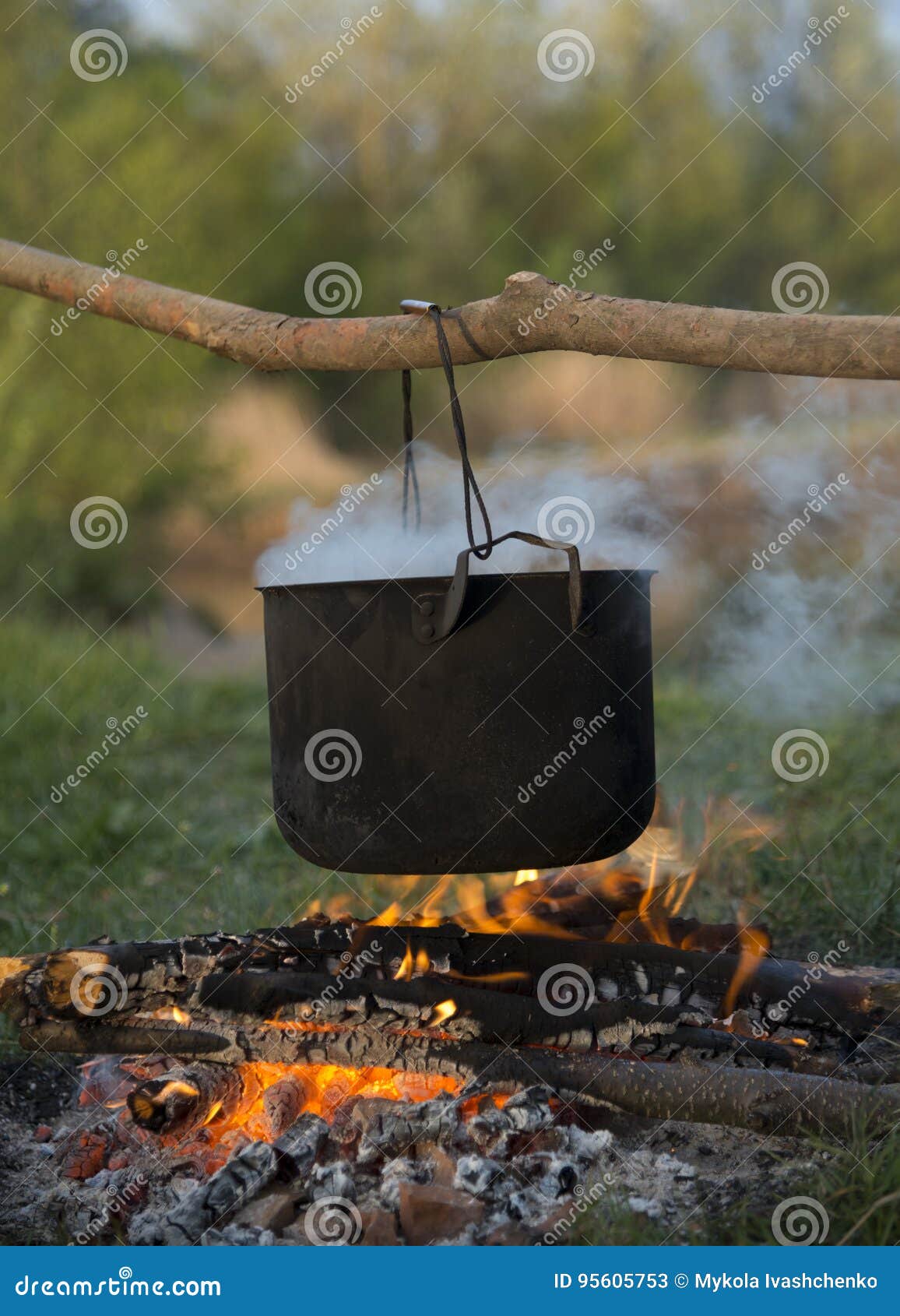 Black pot over fire stock image. Image of summer, flame - 95605753