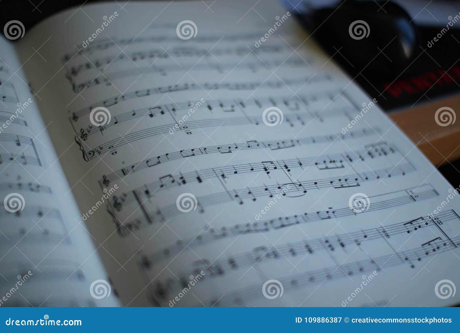 Black Print White Paper Musical Note Book Picture. Image: 109886387